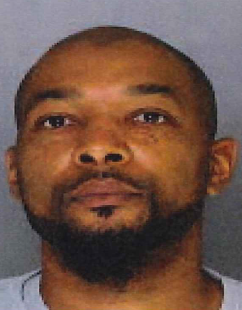 Arrested fugitive jailed without bail after assaulting man with hammer ...